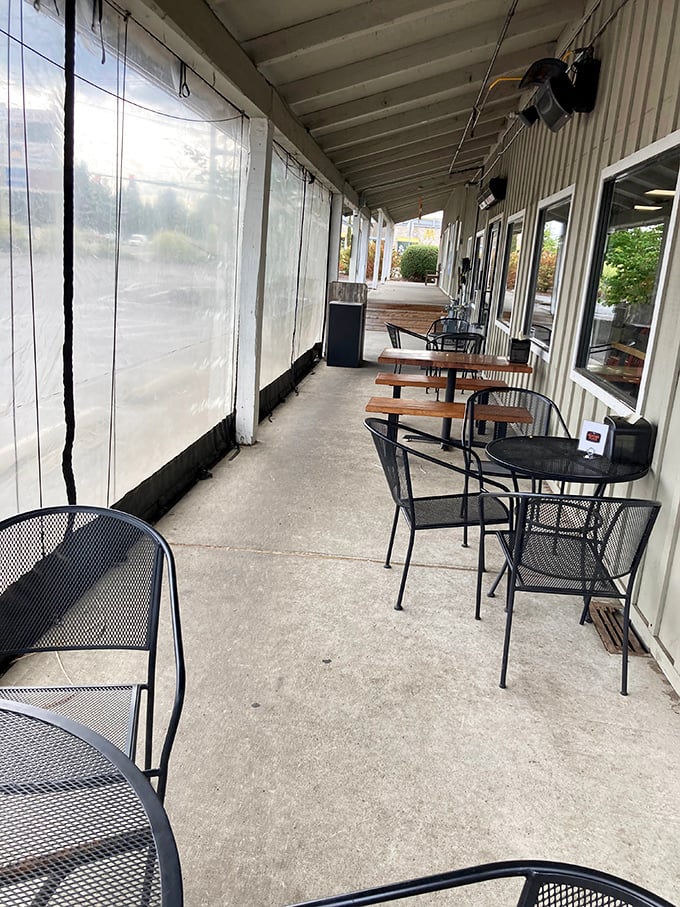 The covered porch offers weather-protected dining with a side of fresh air – Oregon's version of al fresco eating acknowledges rain happens.