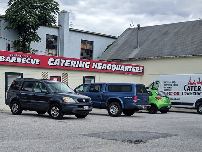 Barbecue headquarters that doesn't need fancy trappings – just parking spaces for hungry visitors and smoke billowing from the back.
