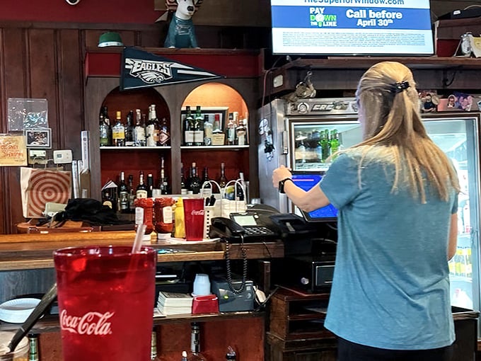 An Eagles pennant watches over the register—this is Philadelphia territory, where sports loyalty and food loyalty go hand in hand.