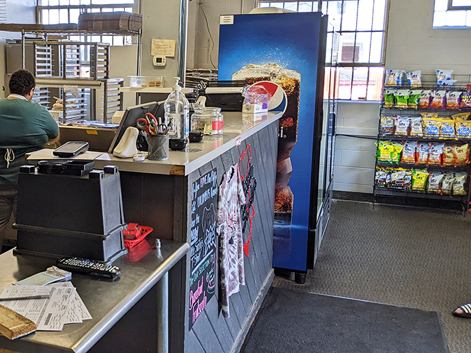 The register area showcases the practical side of pizza paradise – where transactions happen quickly so you can get back to the serious business of eating.