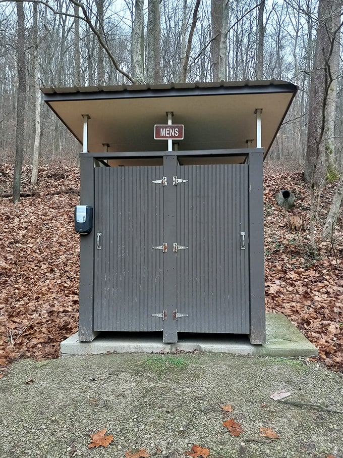Even the facilities blend with nature! This rustic restroom proves that at Tar Hollow, every structure respects its woodland setting.
