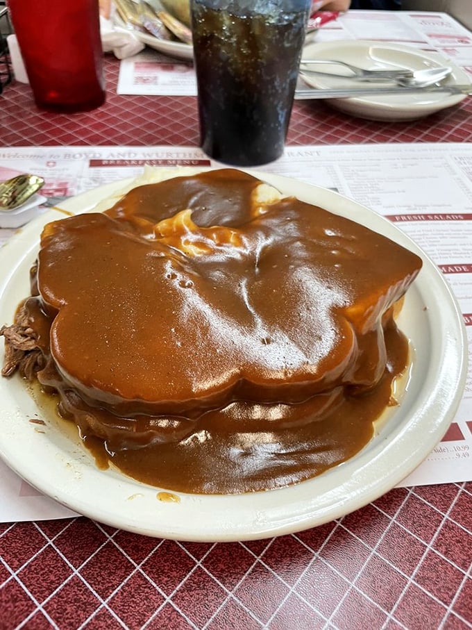 Roast beef swimming in gravy so good you'll consider drinking it like soup when nobody's looking. Your diet can start tomorrow.