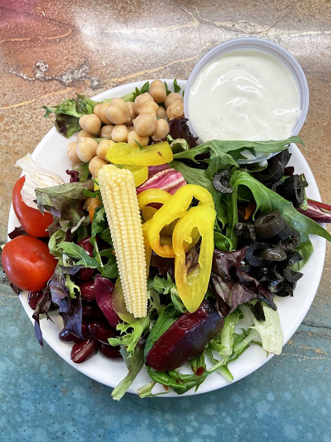 A salad that doesn't apologize for being healthy – bright, fresh, and proving that seafood joints can do more than just fry things.