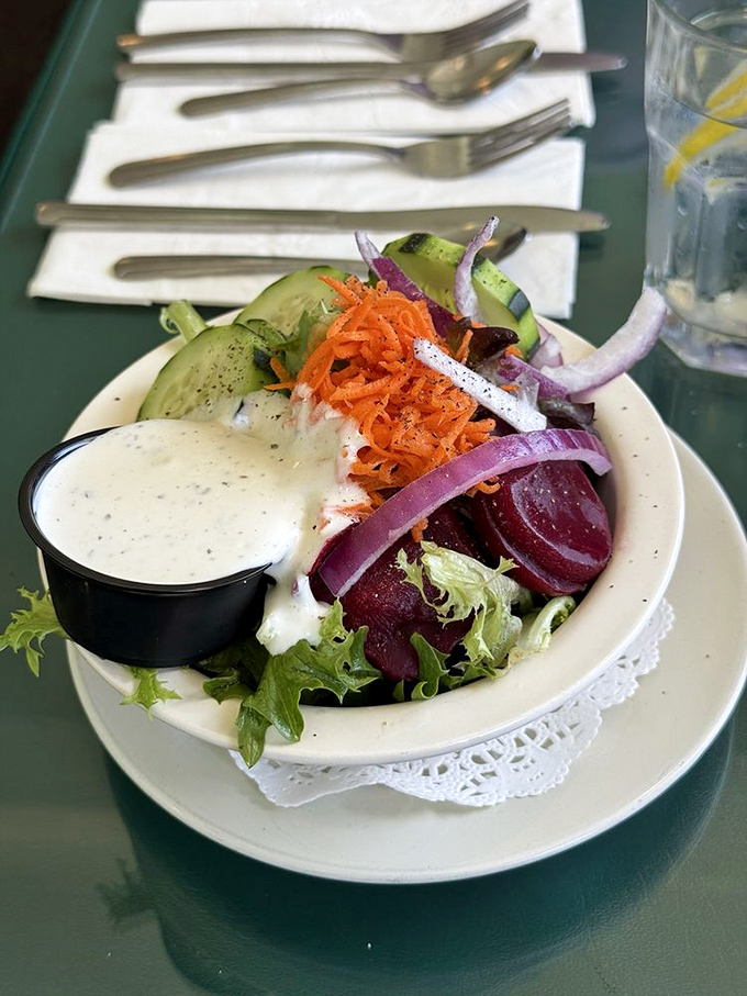 A salad that actually excites—vibrant beets, crisp vegetables, and house-made dressing. Proof that eating healthy doesn't mean suffering.