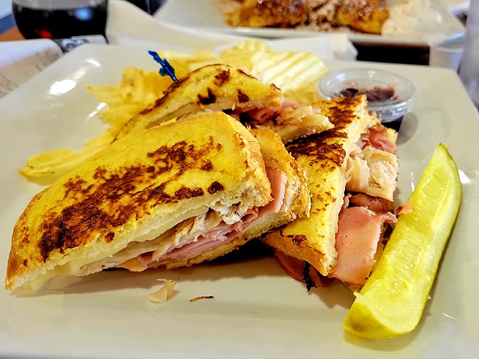 This grilled sandwich isn't playing around—layers of ham and melty cheese creating the ultimate handheld breakfast symphony.