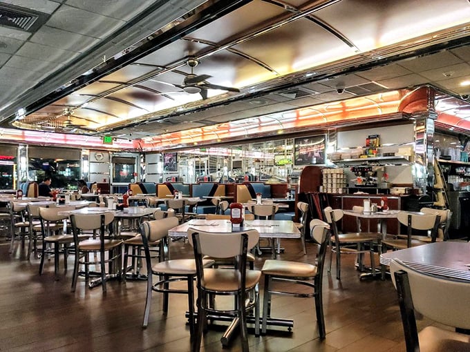Classic diner seating that promises the comfort of routine alongside the excitement of whatever comes out of that kitchen.