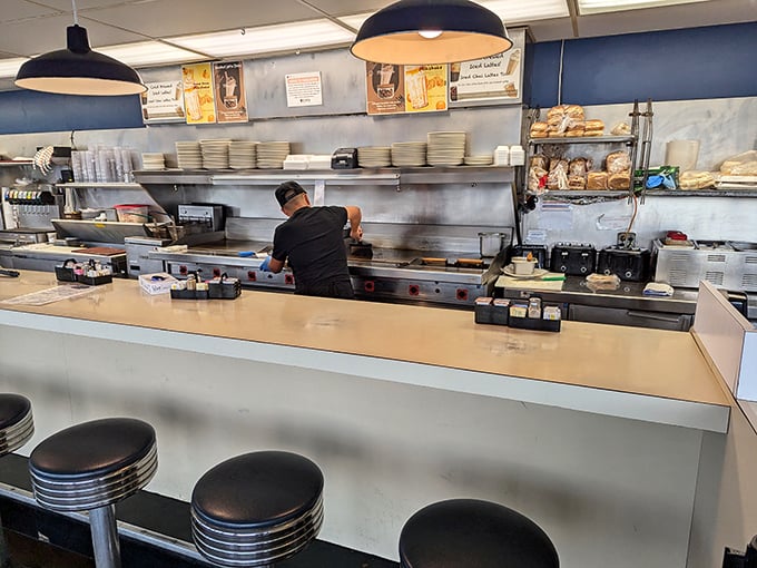 The beating heart of any great diner: a counter where magic happens with spatulas and where regulars earn the right to their "usual."