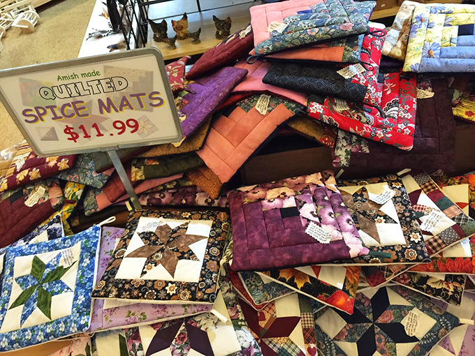 Quilted spice mats in a kaleidoscope of colors and patterns—practical art that brings Pennsylvania Dutch tradition to any kitchen table.