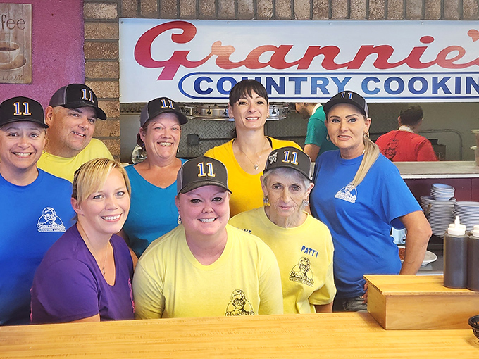 The dream team behind those fluffy biscuits and perfect eggs—wearing smiles as warm as the coffee they'll keep refilling.