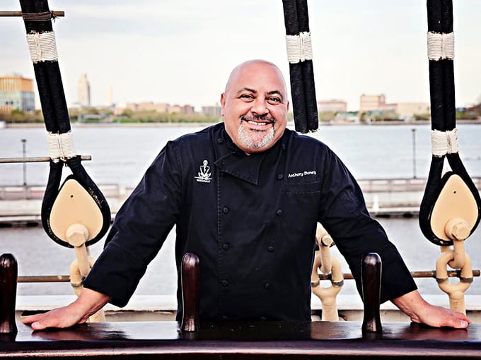 A chef at home on the high seas of cuisine, ready to navigate diners through uncharted waters of flavor with the confidence only experience can bring.
