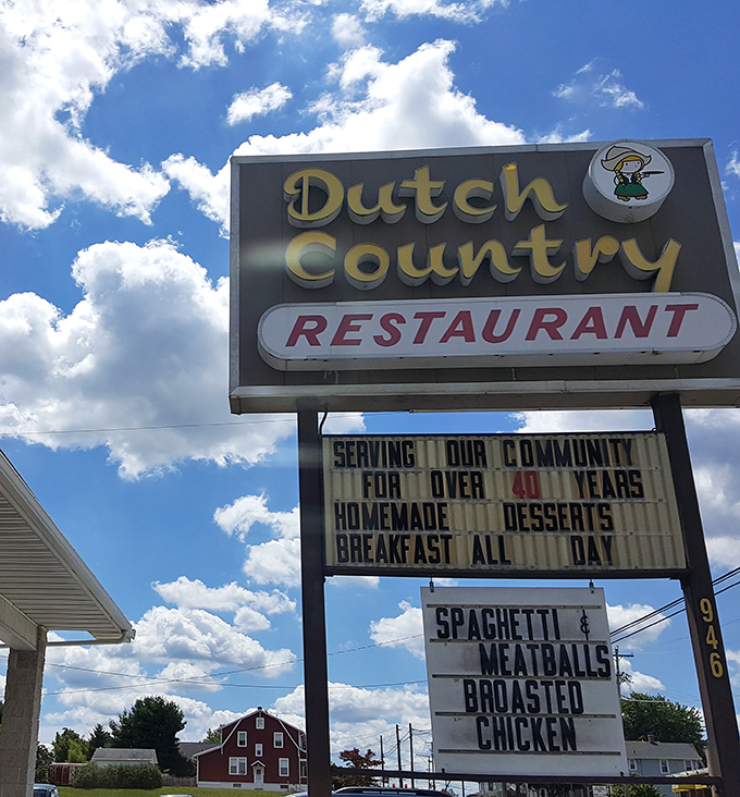 Bold signage announcing homemade desserts and breakfast served all day to hungry, grateful souls.