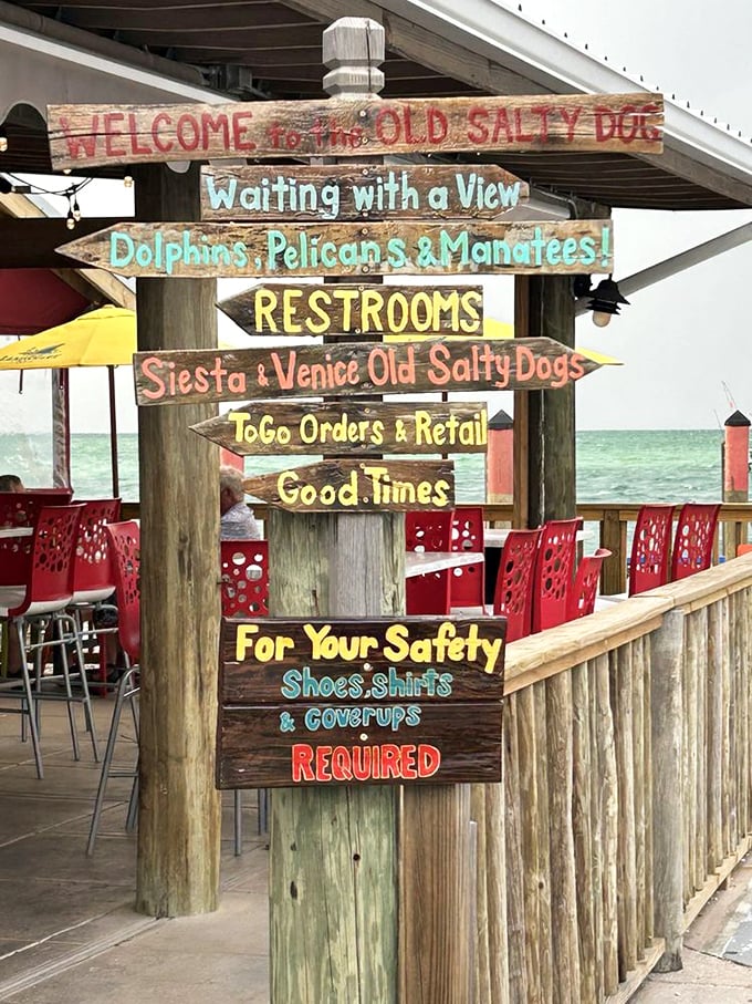 A signpost that could be from a Jimmy Buffett song—directions to good times, cold drinks, and memories waiting to be made.