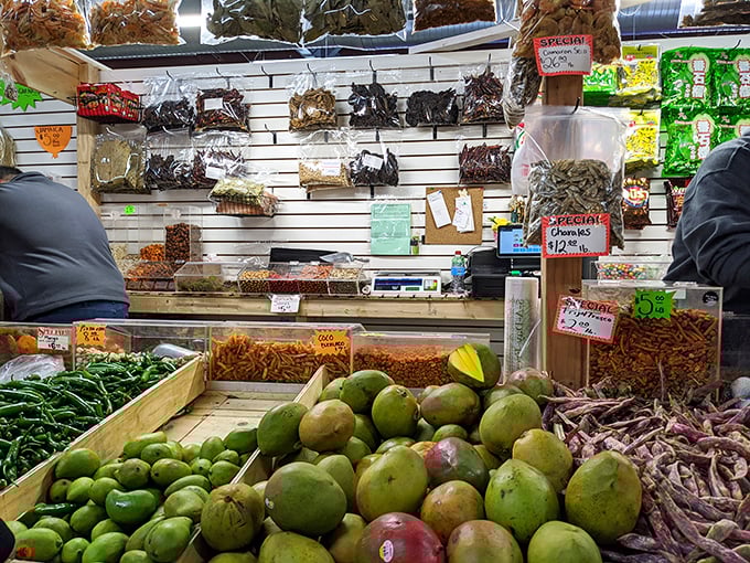 A produce paradise where mangoes meet dried chilies, creating a sensory experience that transports you straight to a mercado south of the border.