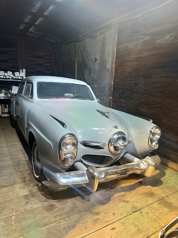 This stunning vintage Studebaker isn't a train, but represents the automobile era that challenged rail's dominance—now they peacefully coexist in the museum.