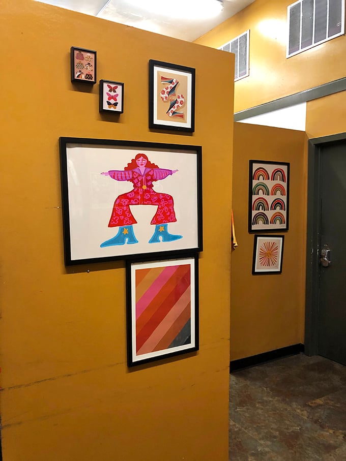 Even the walls tell stories—colorful artwork creates the perfect backdrop for your secondhand style adventure.