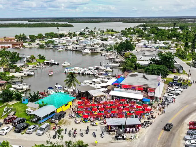 Sunday Funday in full swing—a sea of red umbrellas marks the spot where memories are made and Monday responsibilities forgotten.