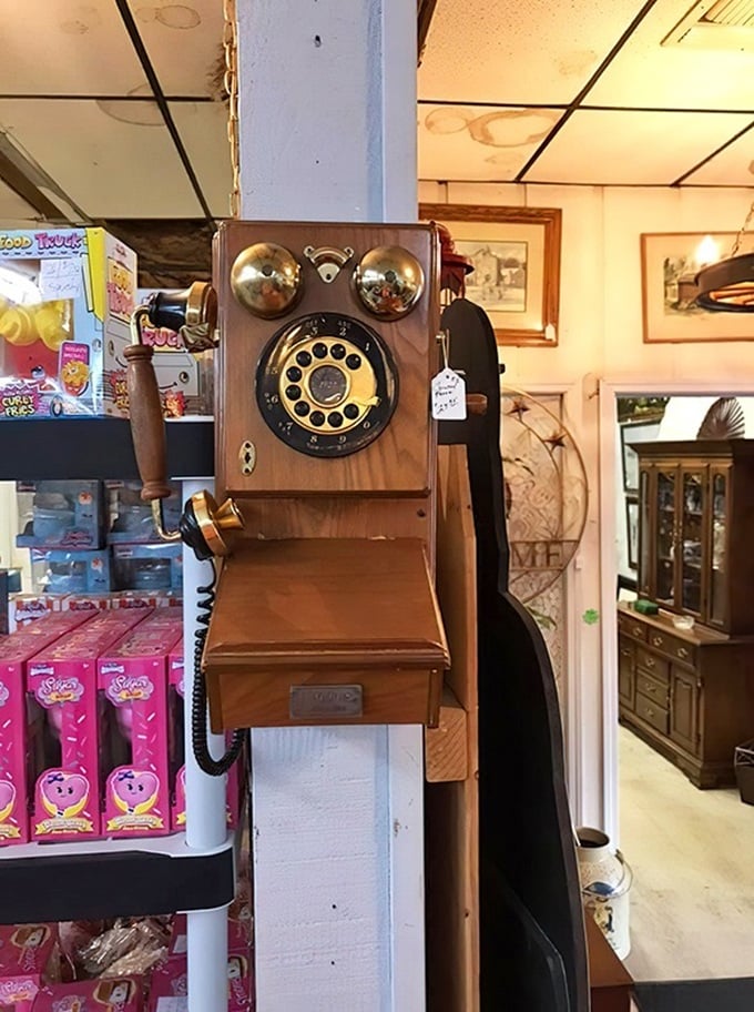 This wooden wall phone has heard more gossip than a small-town diner. Rotary technology that makes smartphones seem soulless by comparison.