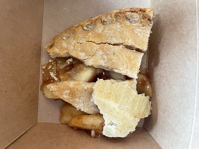 This slice of apple pie isn't just dessert – it's evidence that someone in this kitchen understands the meaning of life.