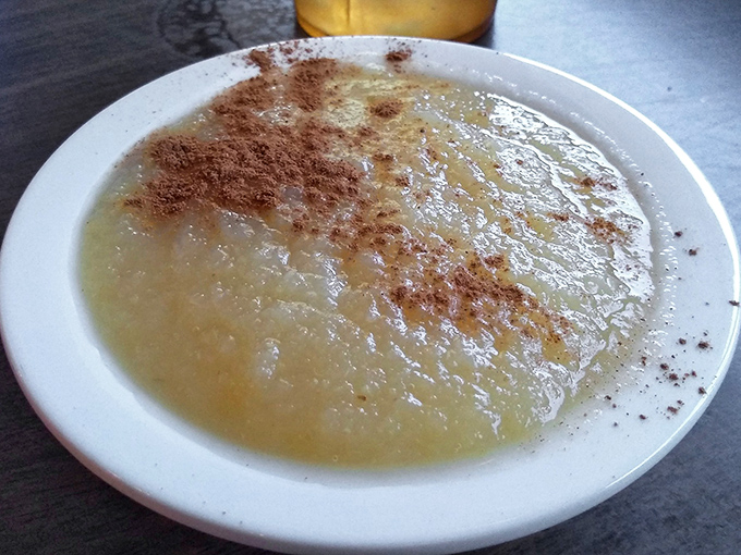 Applesauce with cinnamon sprinkled like fairy dust—a side dish that refuses to be sidelined. Simple, honest food that reminds you why classics become classics.