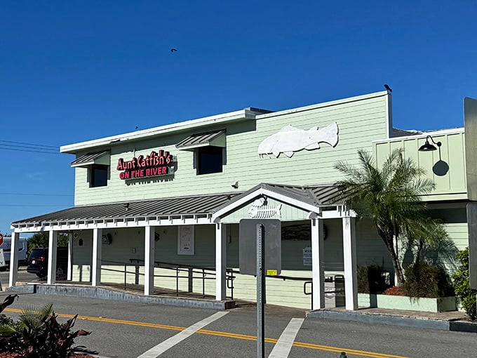 Aunt Catfish's mint-green exterior stands as a beacon for seafood lovers, like a delicious lighthouse guiding hungry sailors to shore.
