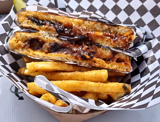 BBQ pulled pork grilled cheese that makes you question your seafood order—until you remember you can always come back tomorrow.