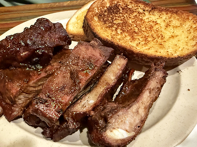 St. Louis ribs with that perfect pink smoke ring and a side of Texas toast. Not just food – it's edible architecture built on generations of know-how.
