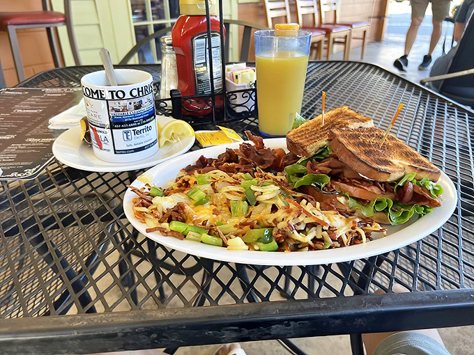 This isn't just a sandwich—it's architecture. Layers of BLT perfection alongside hash browns that somehow manage to be both crispy and tender.