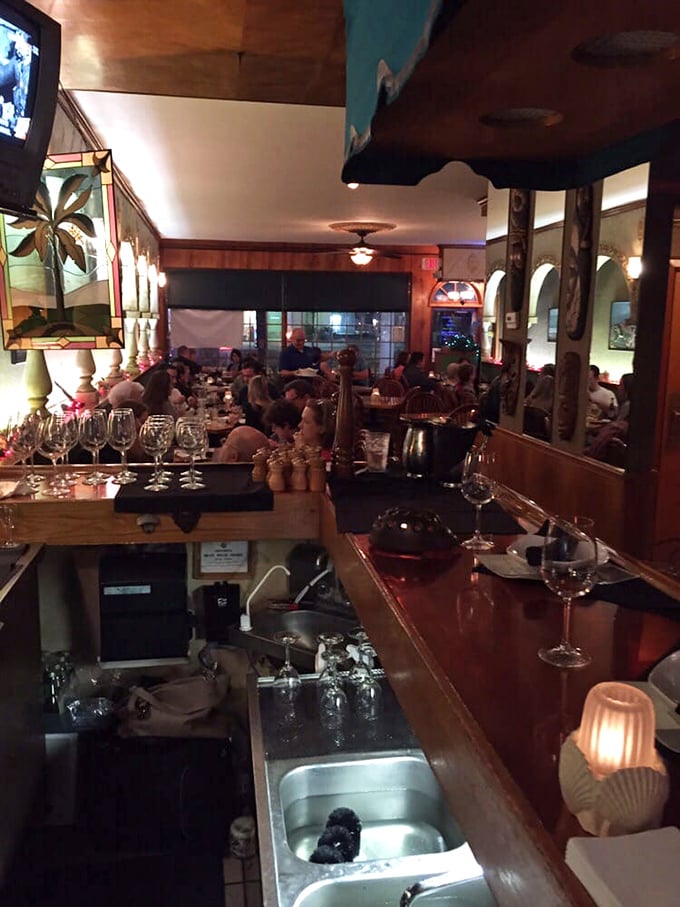 From behind the bar, every table looks like the beginning of someone's perfect evening—a symphony of seafood and satisfaction.