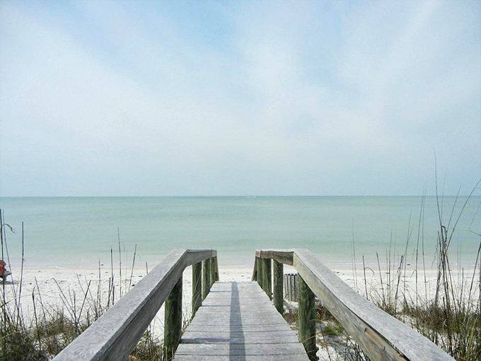 The pathway to serenity. This simple wooden walkway leads to miles of uncrowded shoreline—like having your own private beach.