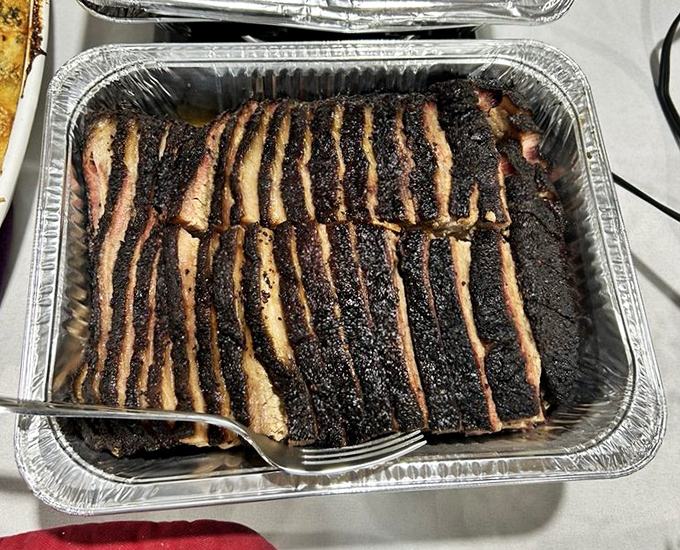 Brisket sliced against the grain reveals the telltale pink smoke ring – barbecue's equivalent of Olympic gold.