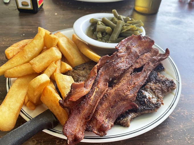 Liver and onions with crispy bacon—a dish that separates casual diners from the true believers. Your grandfather was right about this one all along.
