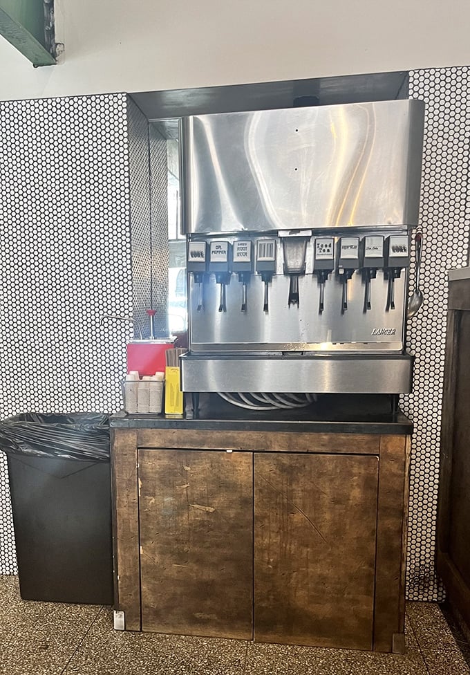 Even the soda machine has a certain industrial elegance to it—because at The Bird, every detail matters, right down to what you're washing that sandwich down with.