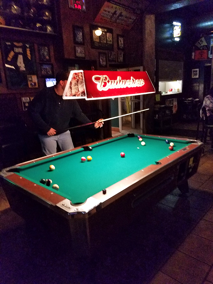 Pool tables and Budweiser signs—some traditions never need updating. The perfect intermission between rounds of food and drink.