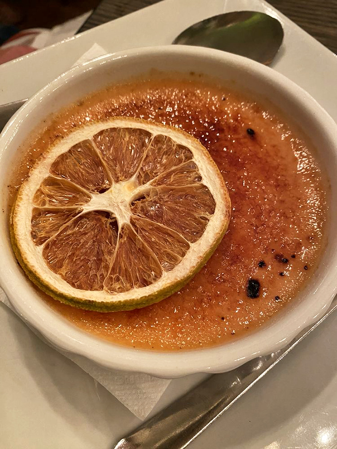 This crème brûlée isn't just dessert – it's performance art with a blood orange twist. That caramelized top deserves a standing ovation.