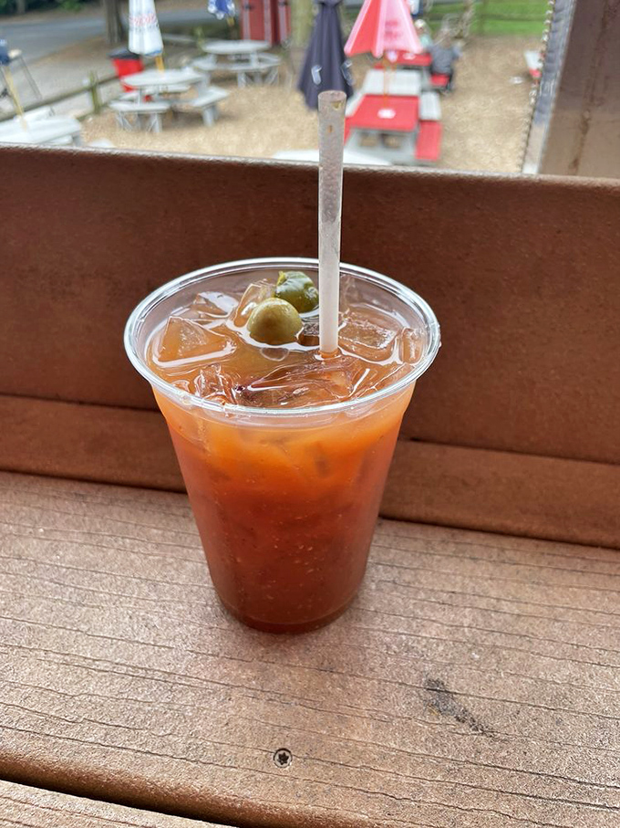 The Bloody Mary that doubles as brunch. That olive isn't garnish—it's punctuation on a statement of island relaxation.