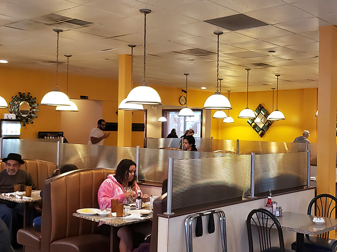 Where strangers become neighbors over coffee and eggs – the booths and tables filled with stories as rich as the food.