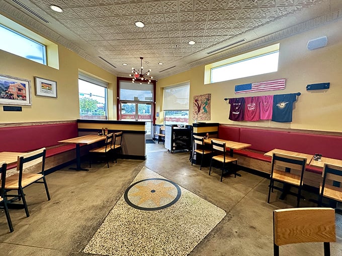 Red booths and sunny yellow walls create the perfect backdrop for morning philosophizing or planning your next meal while enjoying this one.