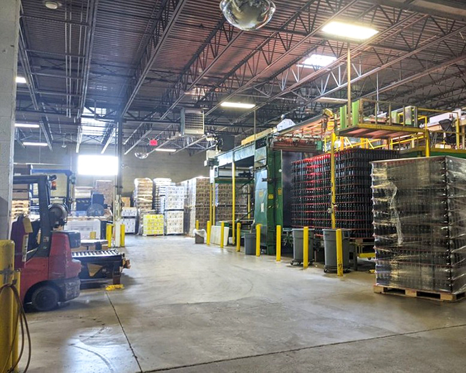 The warehouse – where thousands of bottles wait patiently for their moment to shine in your refrigerator. Liquid joy, ready for deployment.