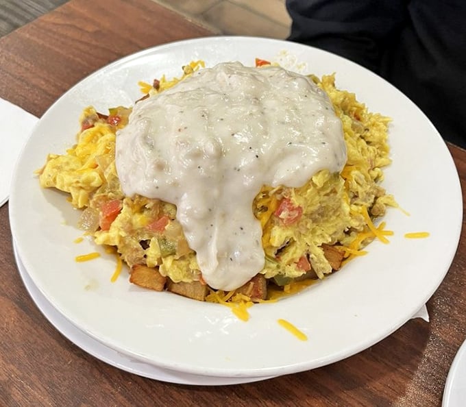 A breakfast scramble that looks like it was created by someone who understands that gravy isn't just a condiment—it's a lifestyle choice.