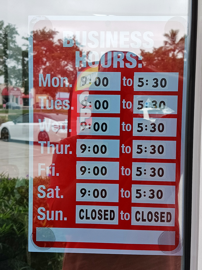 Business hours posted clearly—because knowing when to hunt for treasures is the first step in a successful thrifting expedition.