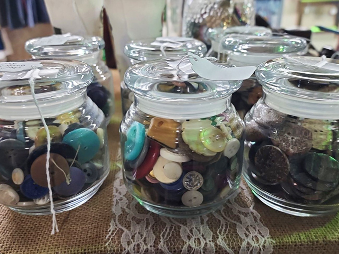 Button, button, who sorted the buttons? These glass jars contain tiny fashion history – each button once fastened someone's Sunday best or everyday workwear.