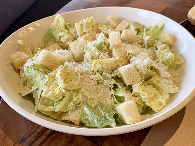 Caesar salad that Julius himself would cross the Rubicon for. Crisp romaine, perfect croutons, and parmesan that doesn't just participate—it performs.