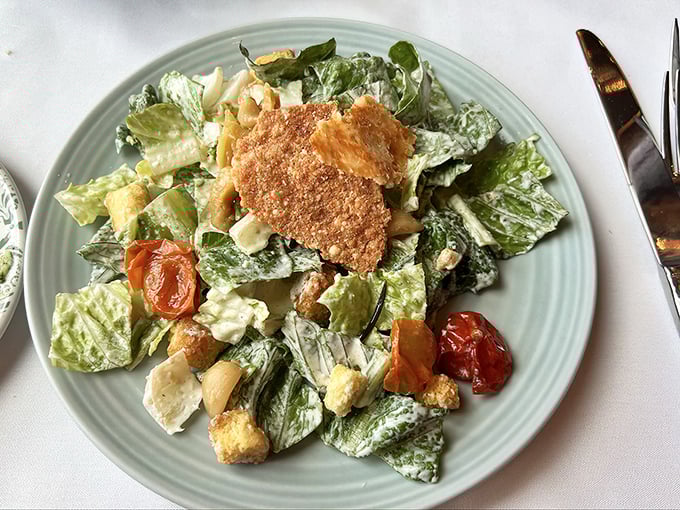 Even salads get the star treatment here – crisp romaine, house-made croutons, and roasted tomatoes prove that vegetables can be more than just obligation eating.