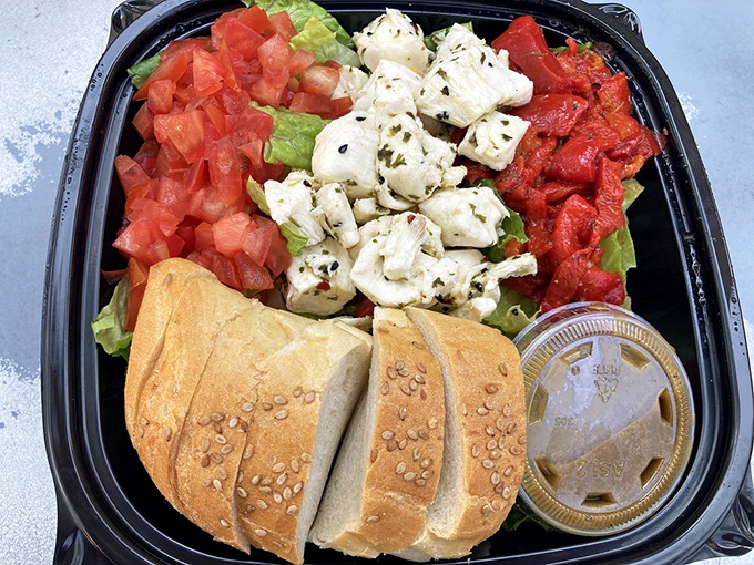 Fresh mozzarella, tomatoes, and basil prove Campo's excellence extends beyond meat – a Mediterranean vacation between two slices of bread.