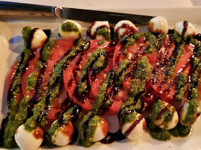 Fresh mozzarella, tomatoes, and pesto drizzled with balsamic – a caprese that offers a moment of lightness before returning to burger nirvana.