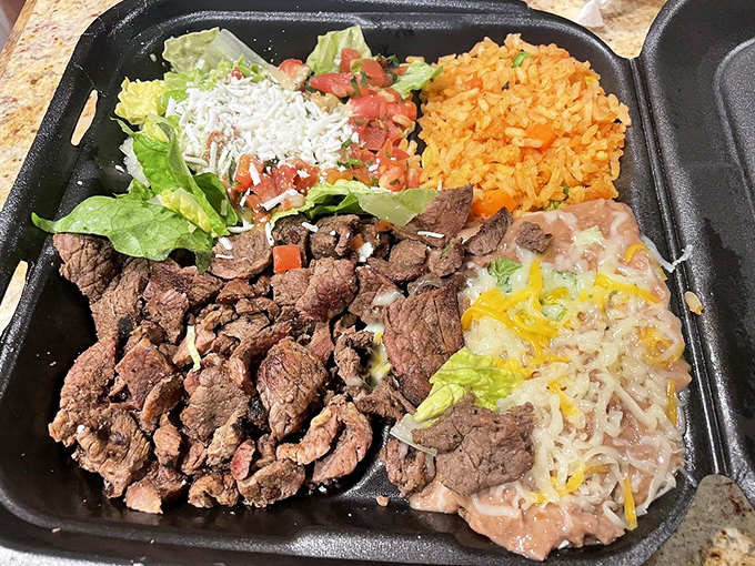 The carne asada plate—a beautiful composition that belongs in both the Louvre and your stomach. Protein, carbs, and vegetables in perfect harmony.
