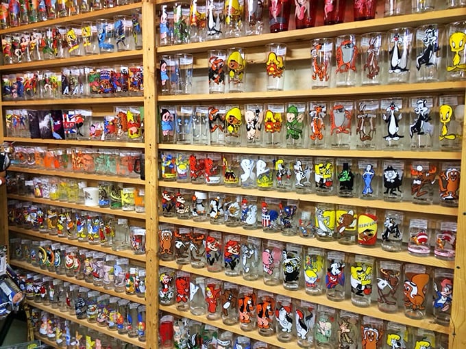 The cartoon character drinking glass wall—where Bugs Bunny, Tweety Bird, and McDonald's giveaways from your childhood patiently await reunion.