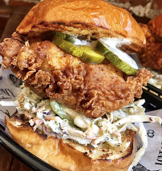 The chicken sandwich that makes you wonder why you've wasted your life eating inferior versions. Pickles, slaw, and glory.