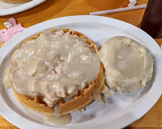 Chicken and waffles: the breakfast-dinner hybrid that proves some of the best relationships are unexpected ones. That gravy doesn't just drip—it delivers.