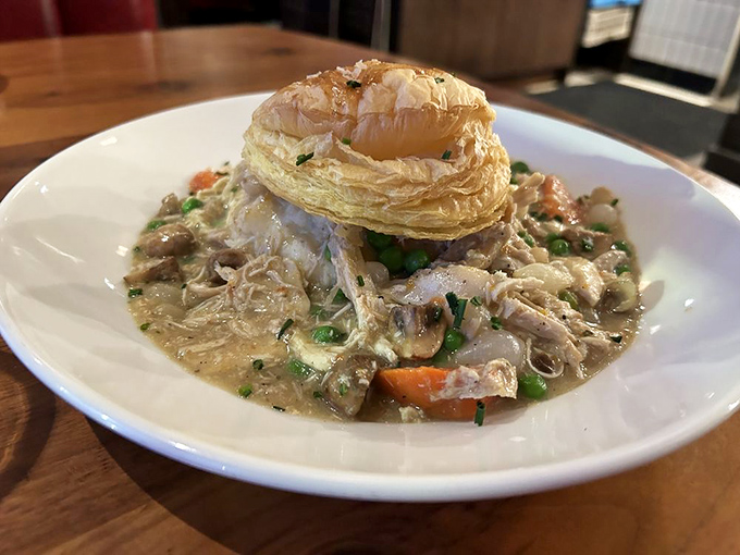 This chicken pot pie isn't just comfort food—it's a flaky-topped time machine that transports you straight back to the best version of childhood.